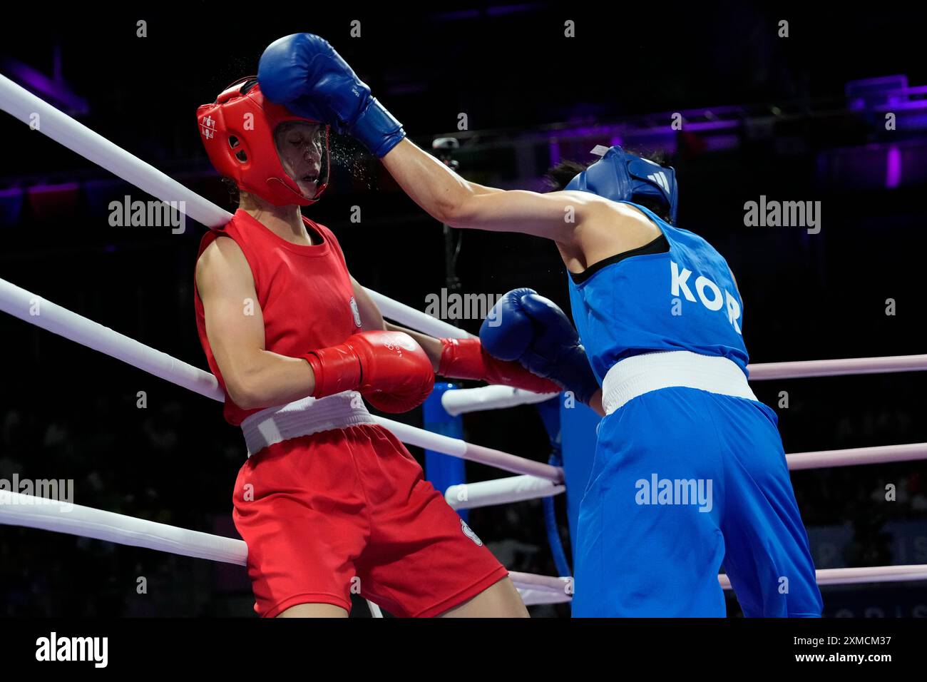 South Korea's Oh Yeonji hits Taiwan's Wu Shih-Yi in their women's 60 kg ...