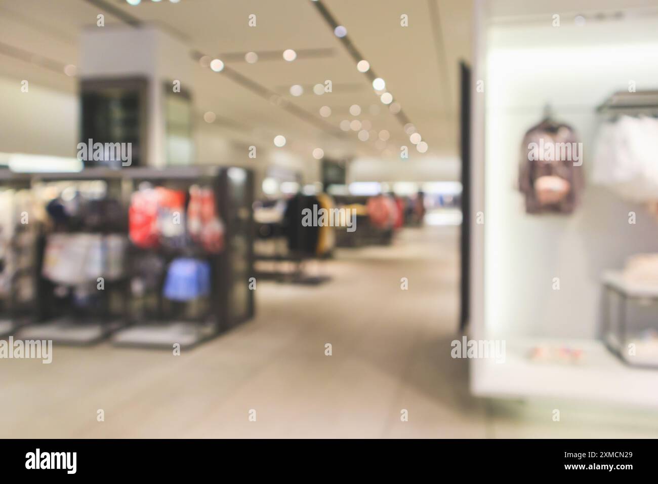 Abstract blur clothing boutique store display interior of shopping mall ...