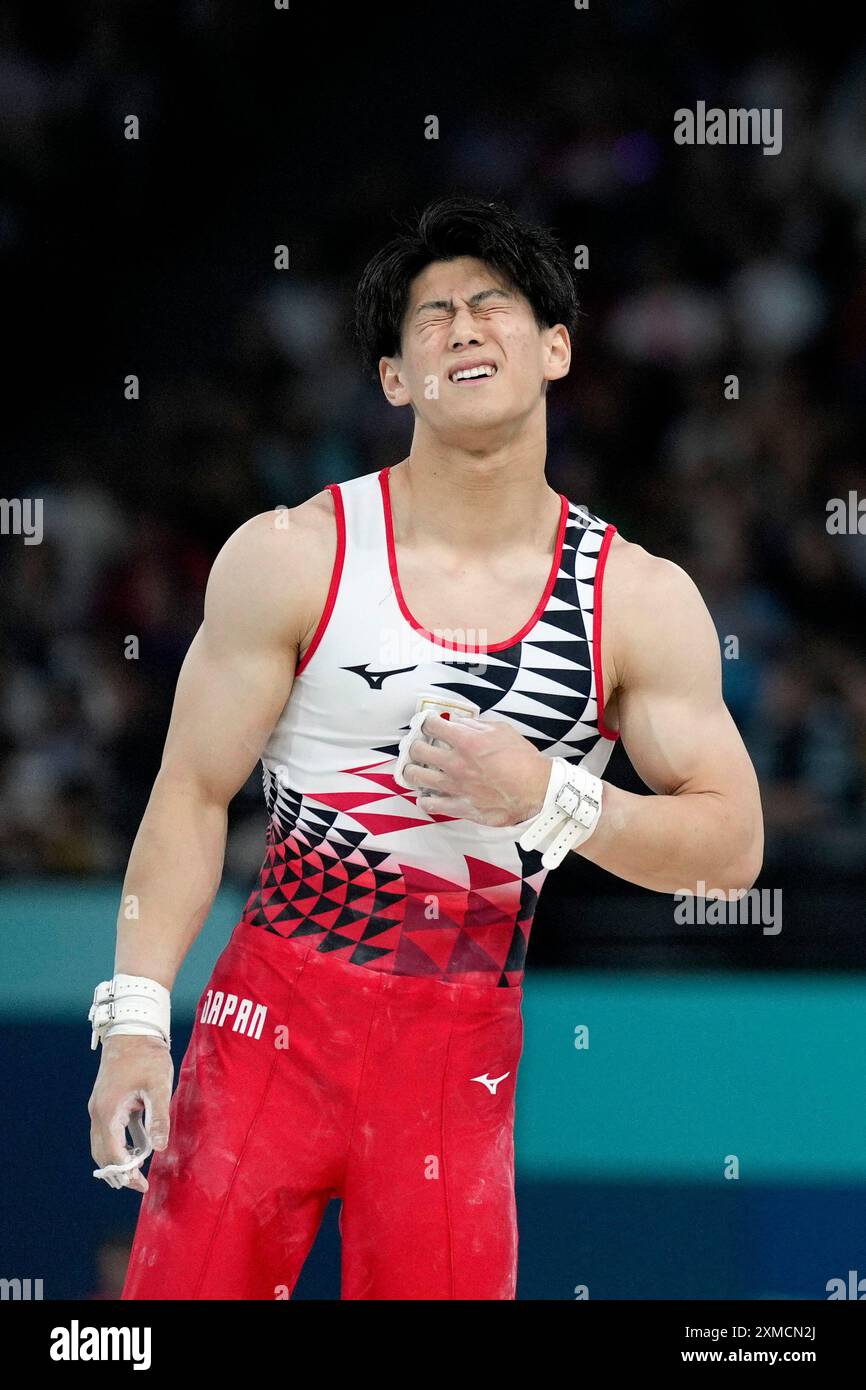 Daiki Hashimoto, of Japan, stands on the mat after competing on the ...