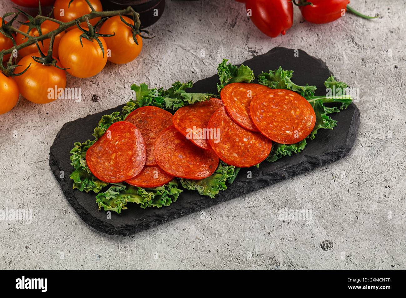 Spanish salami cured chorizo sausage slices Stock Photo - Alamy