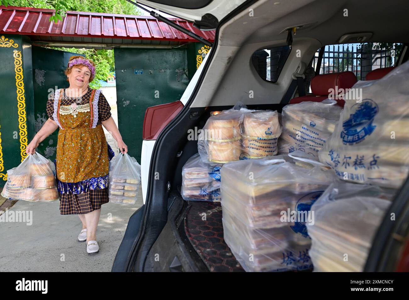 (240727) -- TACHENG, July 27, 2024 (Xinhua) -- Zaitunna puts ...