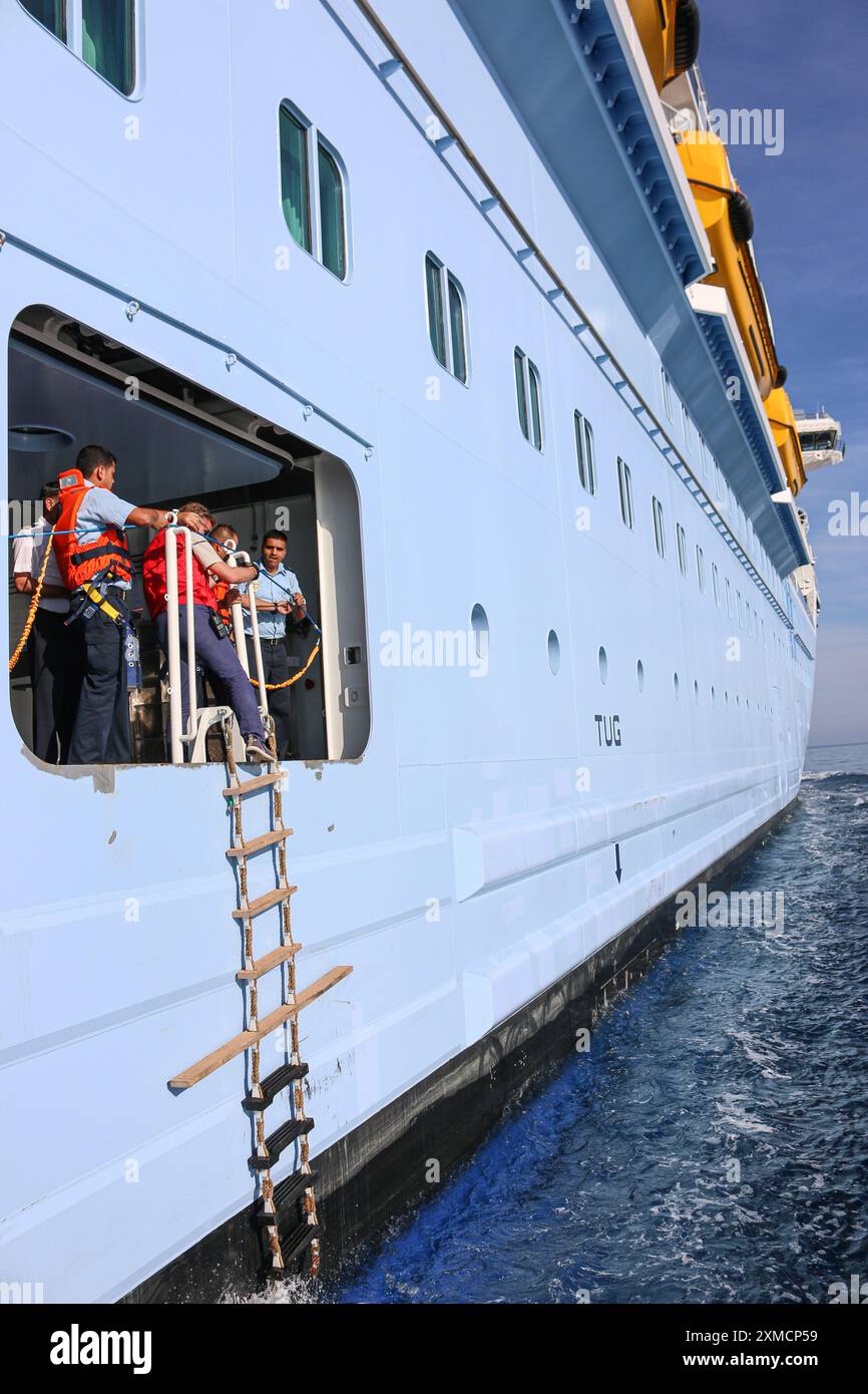 Nice, France : Harbor pilot boat approaching the giant Royal Caribbean ...