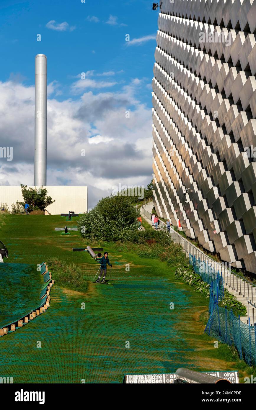 CopenHill, waste incineration plant and artificial ski slope, skiing with a view of the ski lift ...