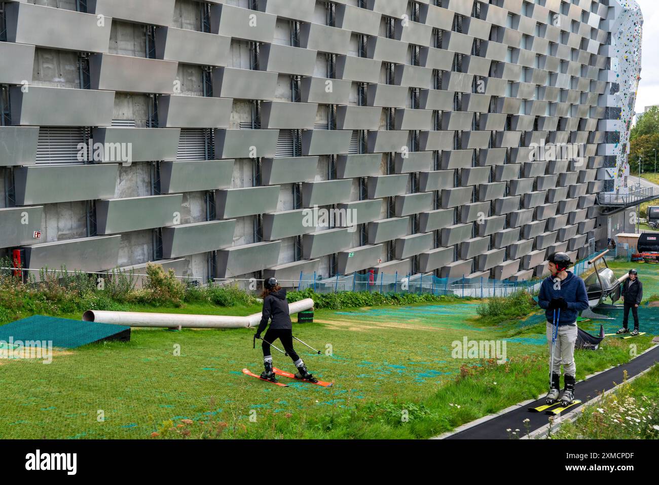 CopenHill, waste incineration plant and artificial ski slope, skiing with a view of the ski lift ...