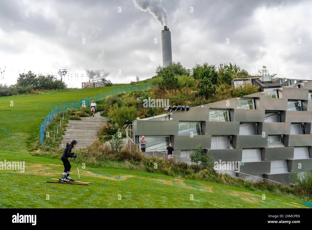 CopenHill, waste incineration plant and artificial ski slope, skiing with a view of the ski lift ...