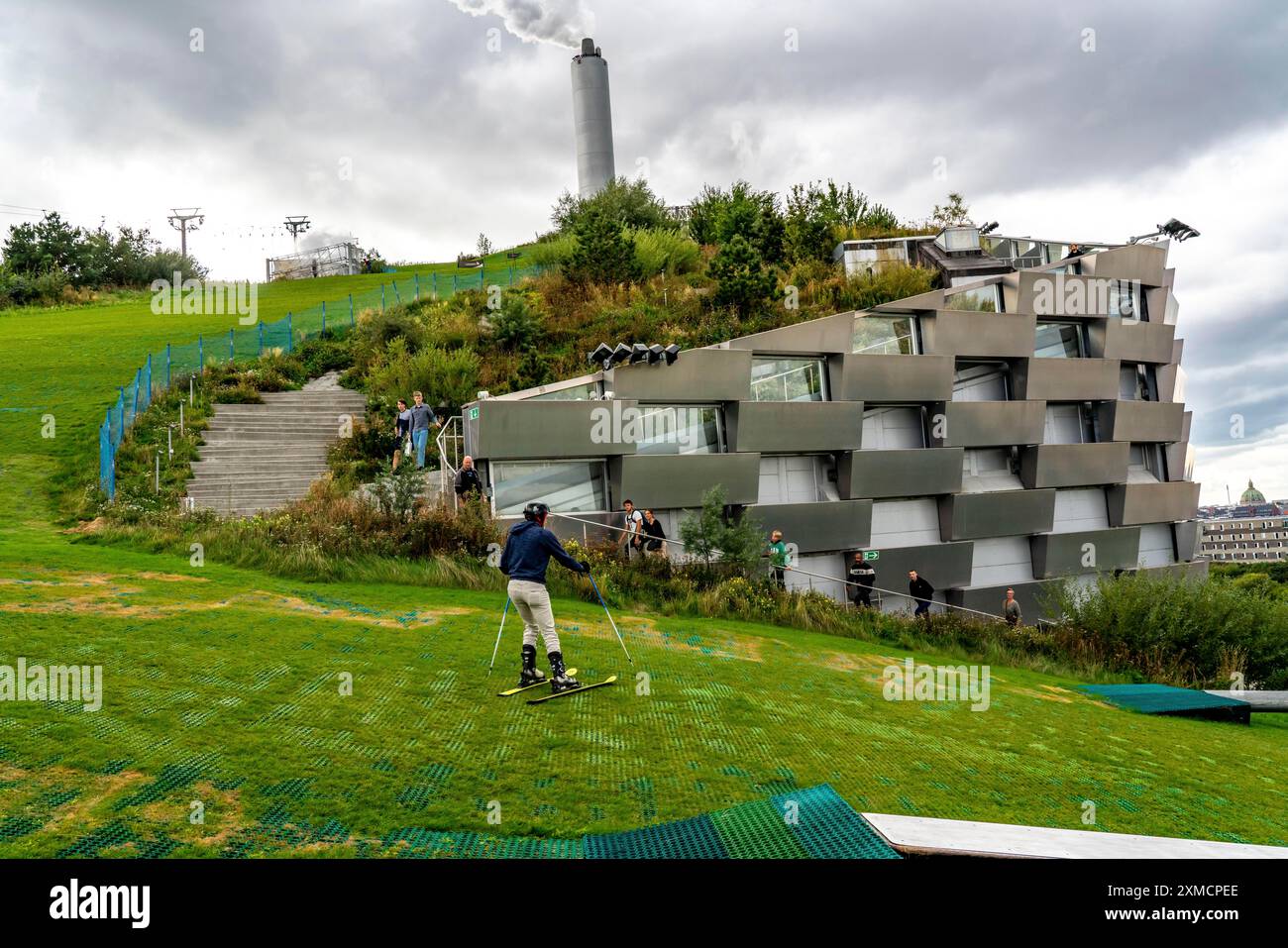 CopenHill, waste incineration plant and artificial ski slope, skiing with a view of the ski lift ...