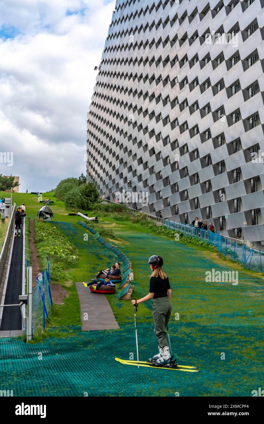 CopenHill, waste incineration plant and artificial ski slope, skiing with a view of the ski lift ...