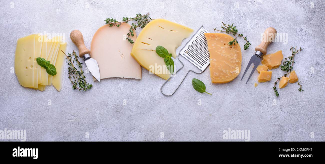 Parmesan, cheddar, gouda and maasdam cheese Stock Photo - Alamy