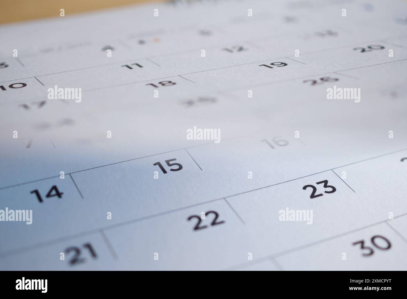 calendar page flipping sheet close up background Stock Photo - Alamy