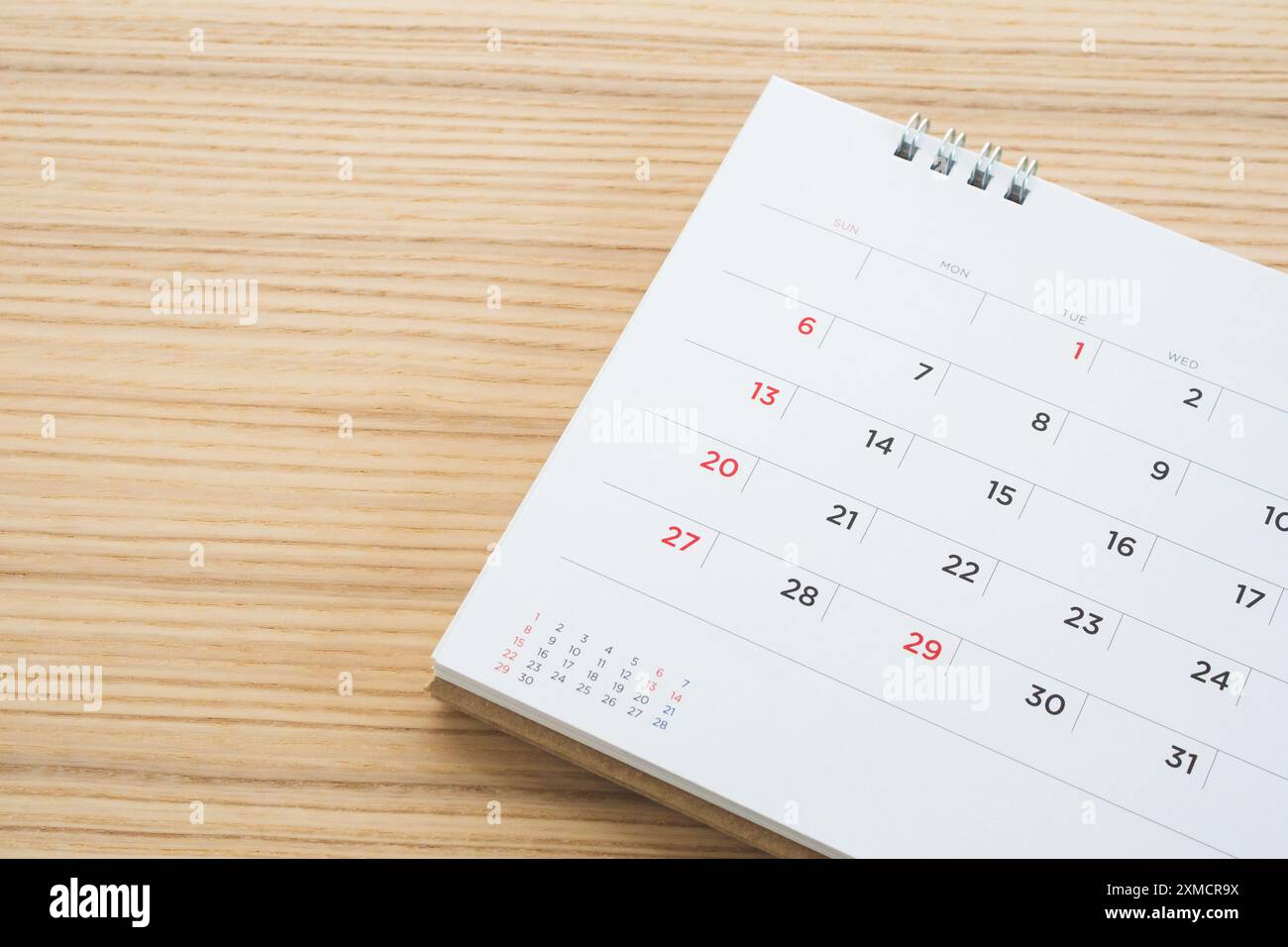 calendar page on wood table background Stock Photo - Alamy