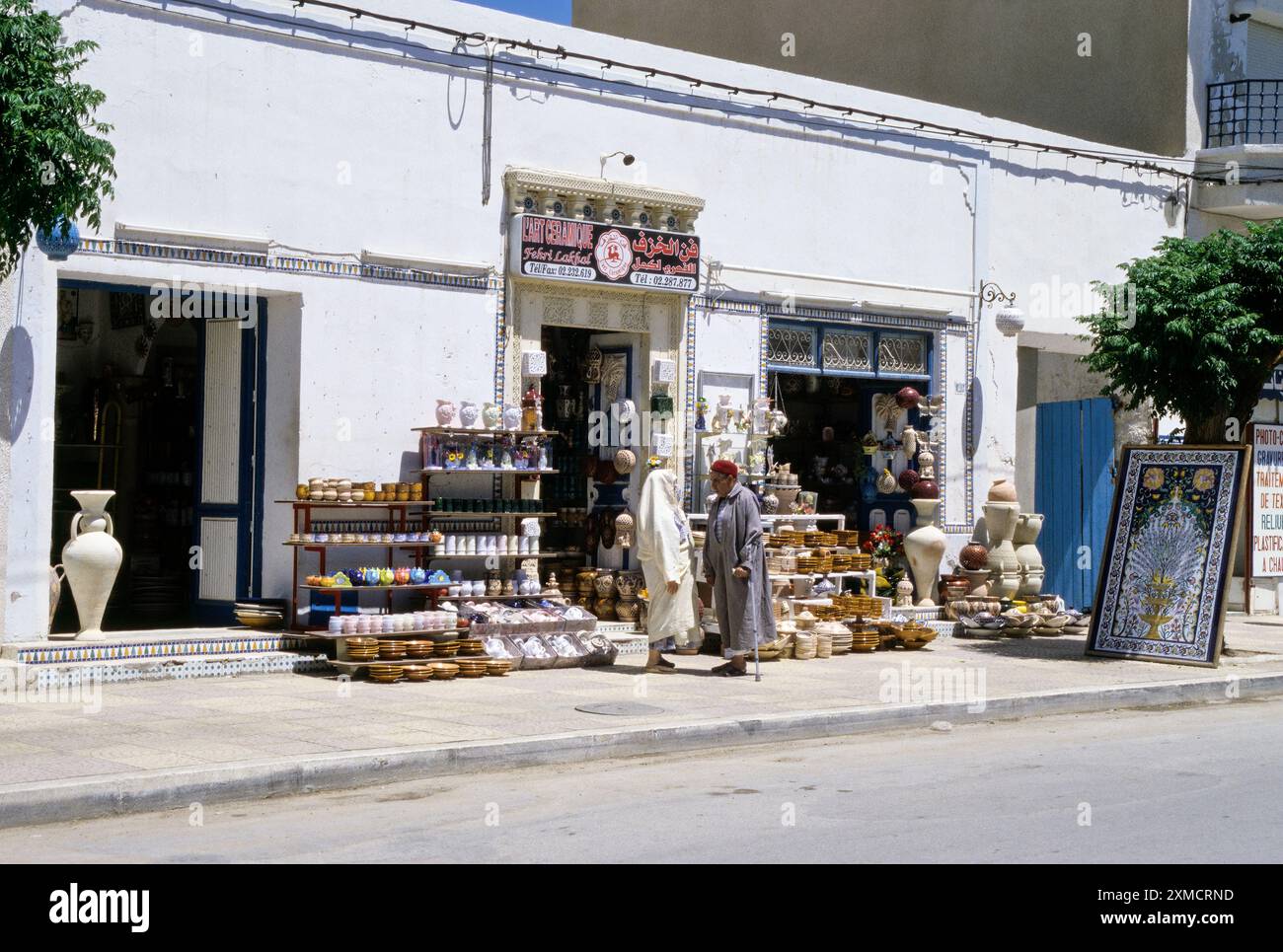 Ceramics, Nabeul, Tunisia. Pottery Shop. Man and Woman in Traditional ...