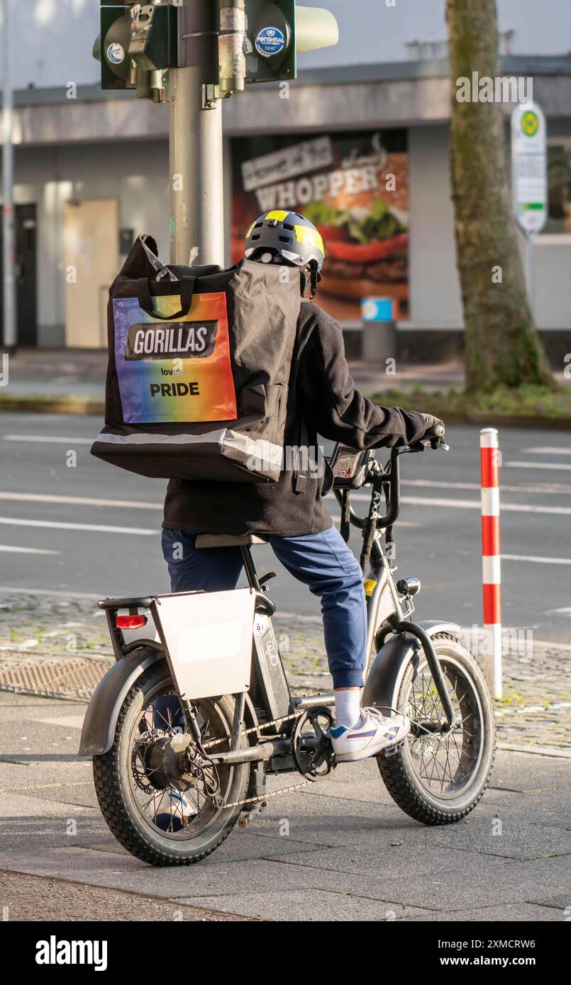 Bicycle courier from the fast delivery service Gorillas, delivers ...