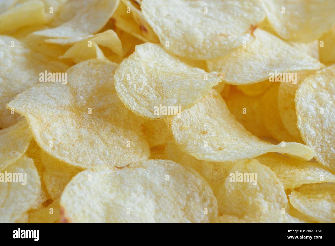 crispy potato chips snack texture background Stock Photo - Alamy