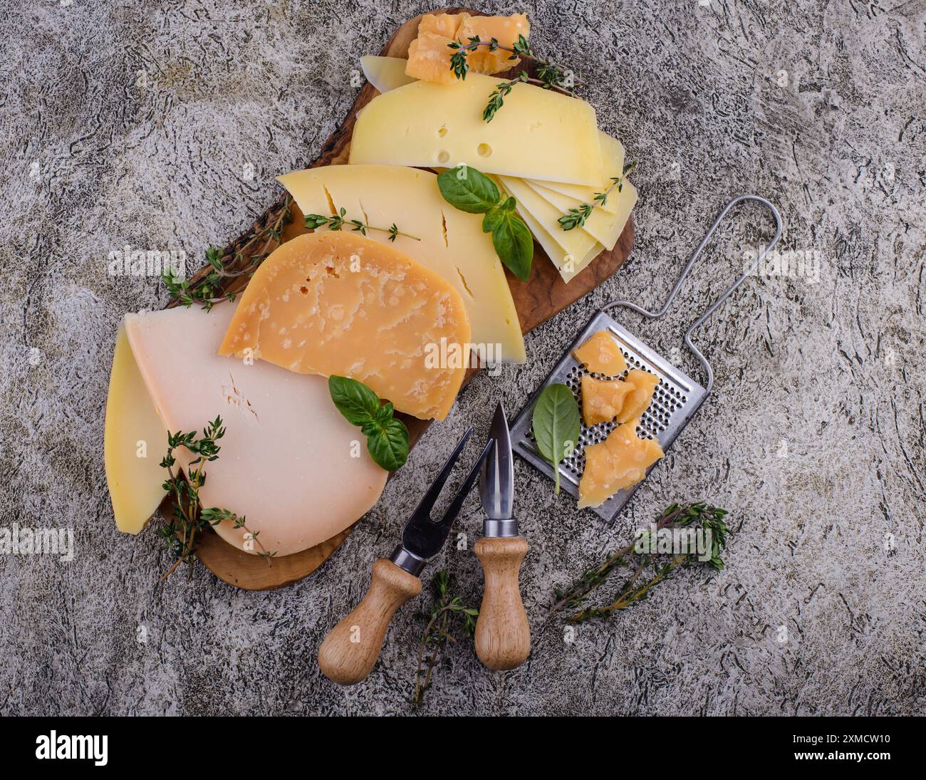 Parmesan, cheddar, gouda and maasdam cheese Stock Photo - Alamy