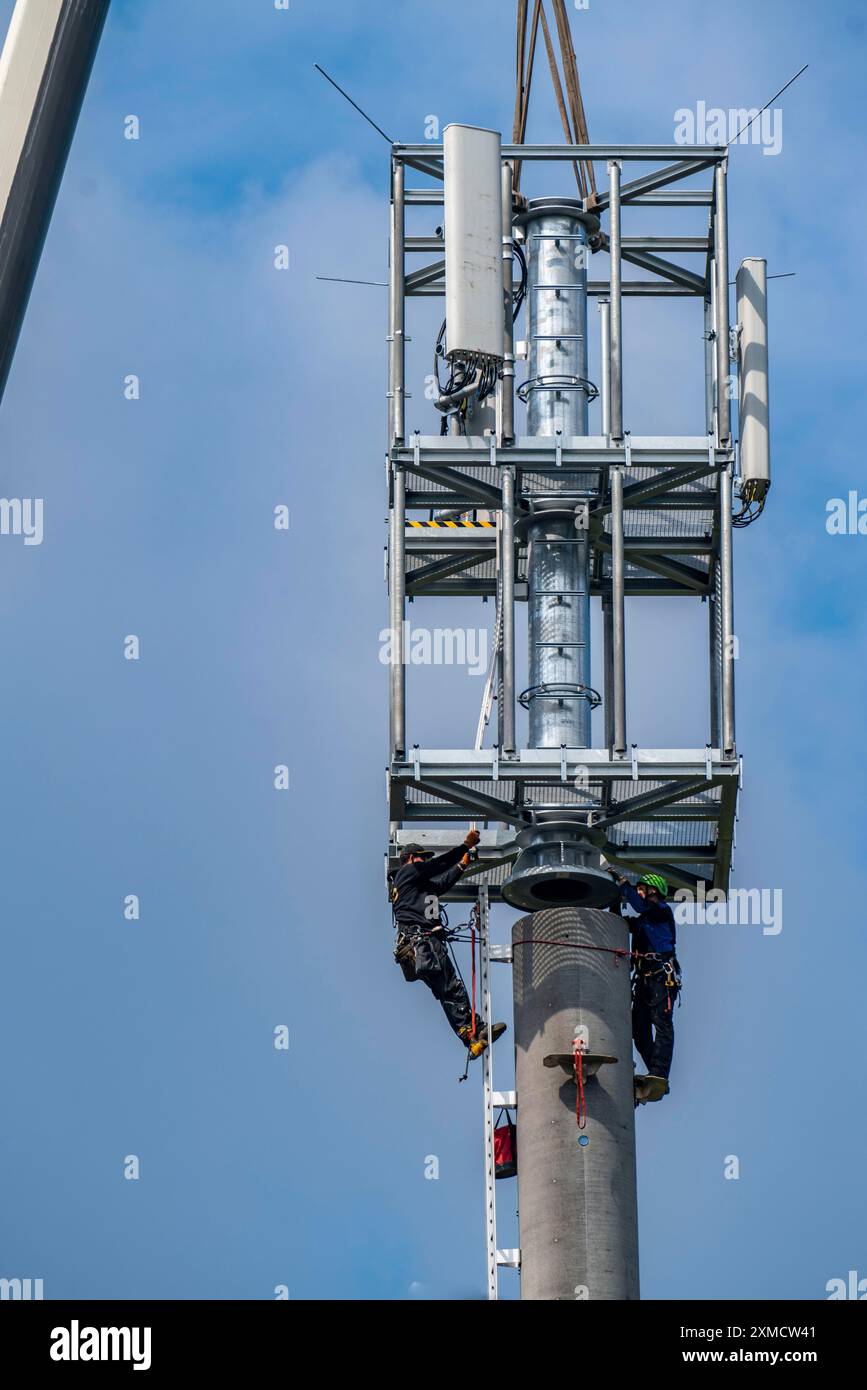 Installation, construction of a 5G mobile phone transmitter, mast for ...