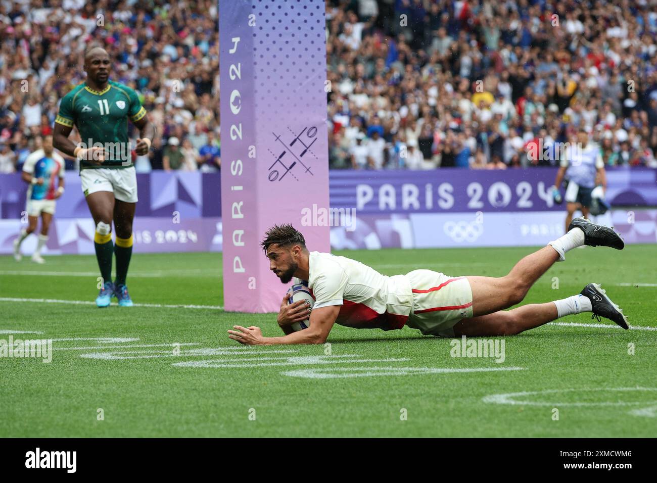 PARIS, FRANCE. 27th July, 2024. Rayan Rebbadj of France scores a try ...
