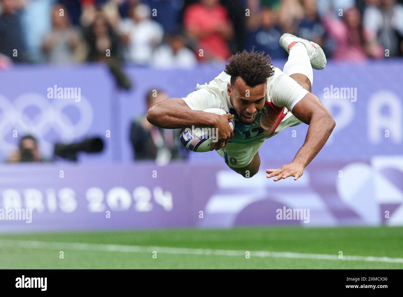 PARIS, FRANCE. 27th July, 2024. Jordan Sepho of France scores a try ...