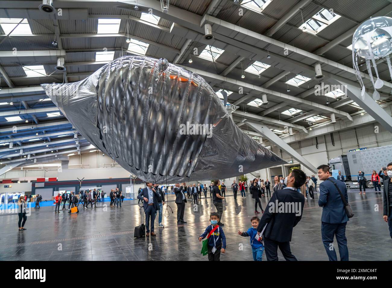 Mechanical flying objects, filled with helium, controlled by fine ...