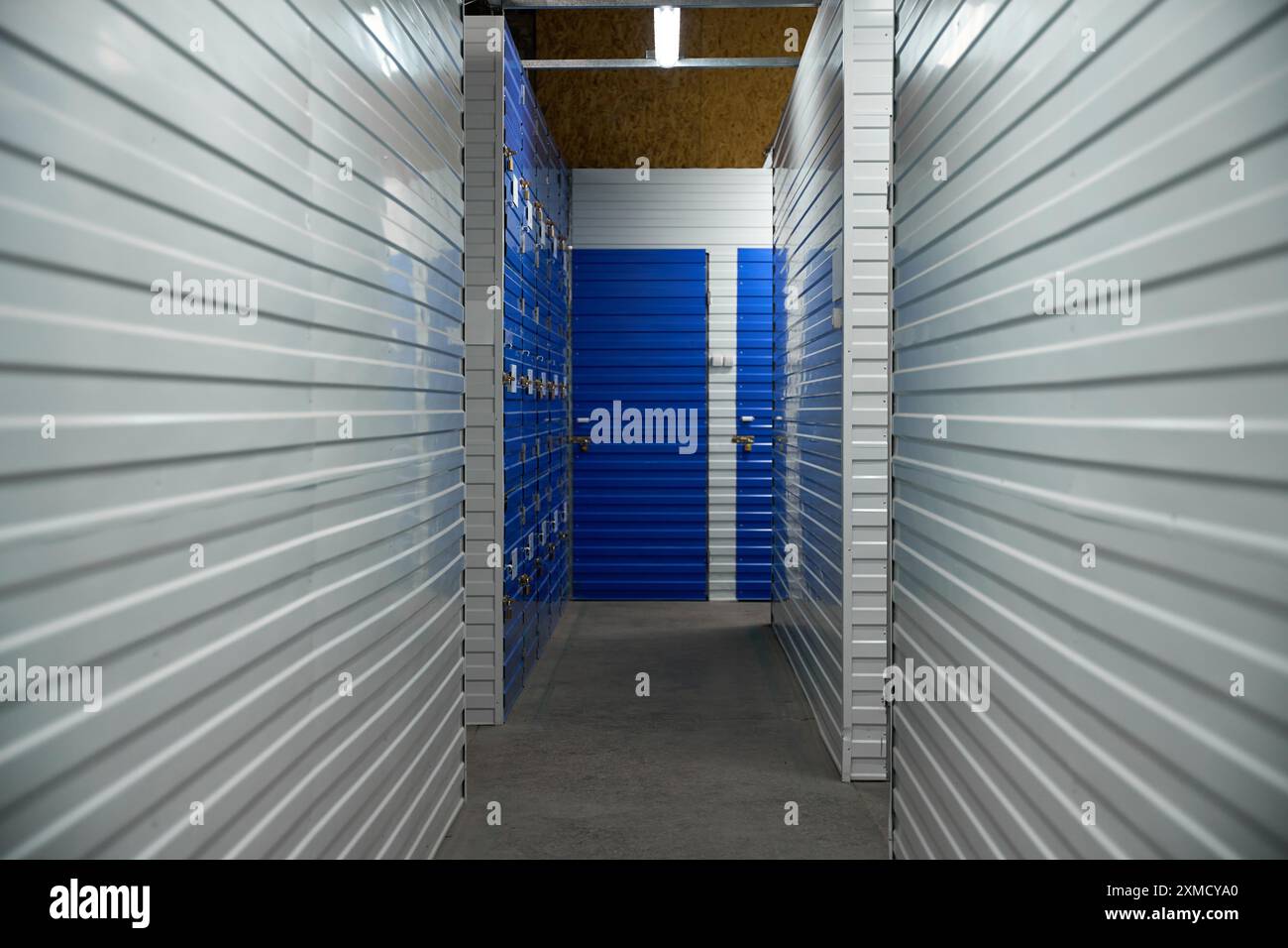 Concept of warehouse. Storage rooms with corridor Stock Photo - Alamy