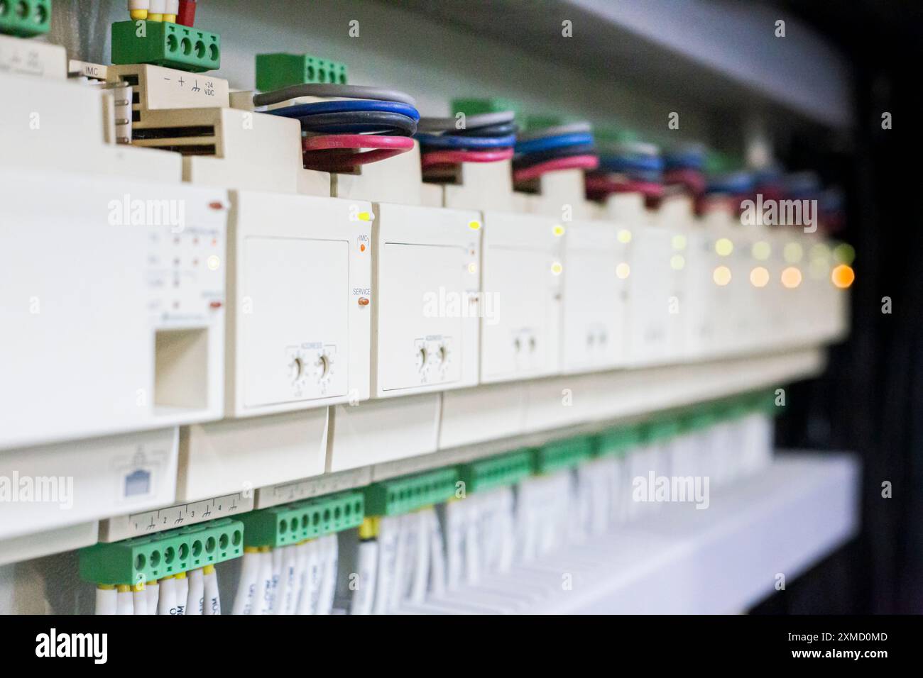 Electrical control devices are installed in a row Stock Photo - Alamy