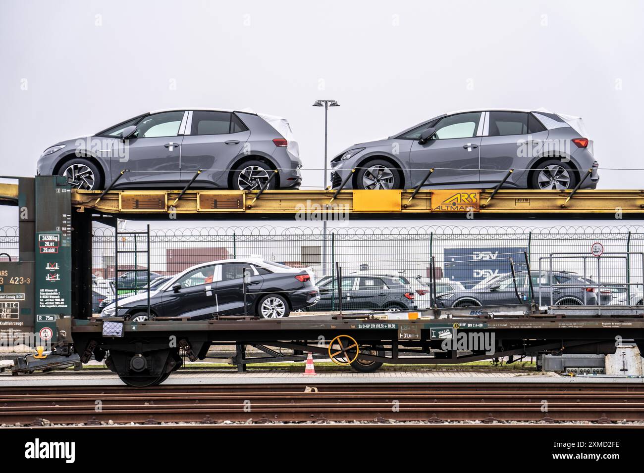 Freight train, car transporter brings new cars from Germany, for export ...