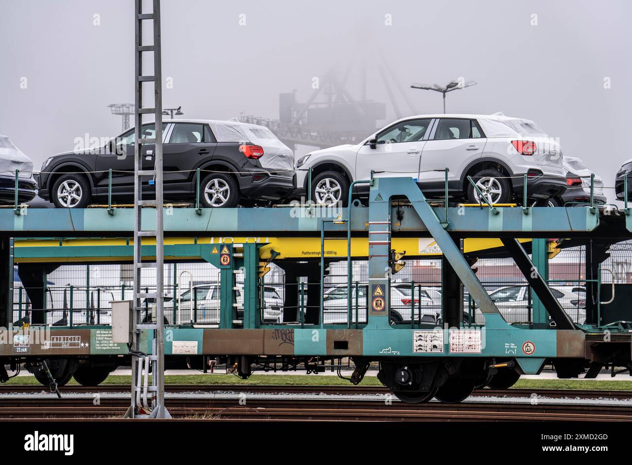 Freight train, car transporter brings new cars from Germany, for export ...