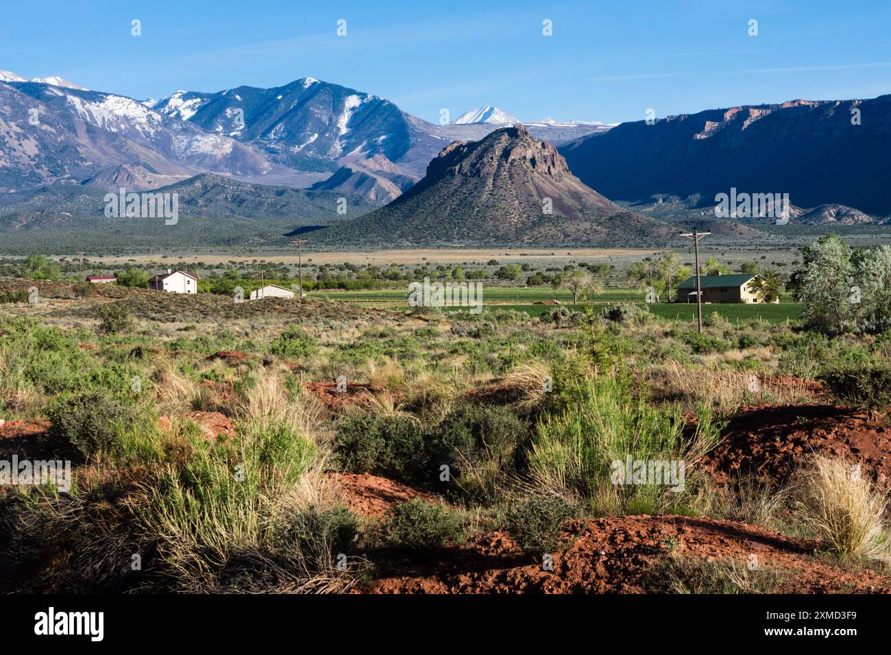 Round Mountain in Castle Valley with La Sal mountain range in the ...