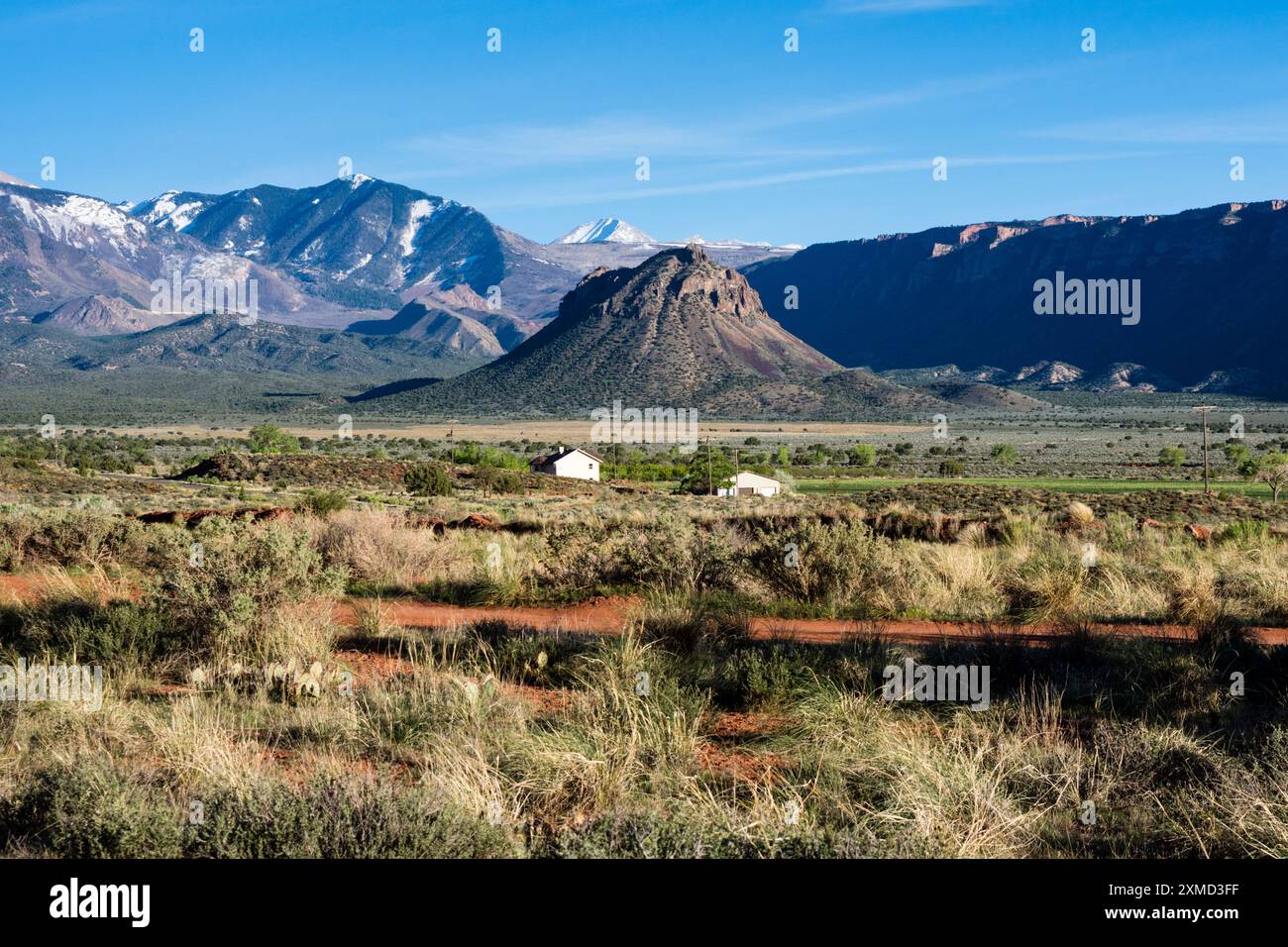 Round Mountain in Castle Valley with La Sal mountain range in the ...