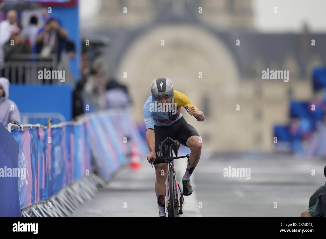 Remco Evenepoel, of Belgium, wins the men's cycling time trial event ...