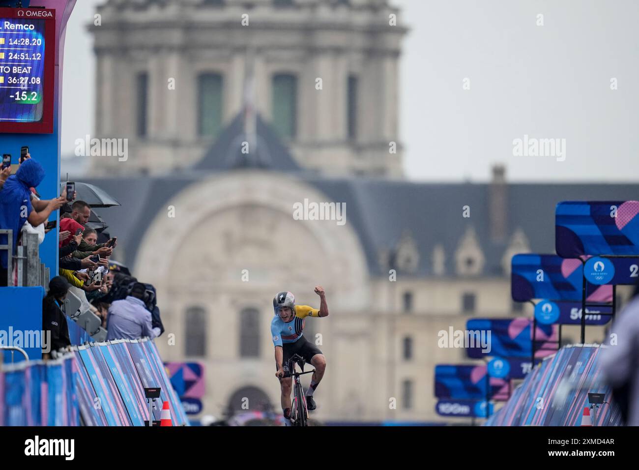 Remco Evenepoel, of Belgium, wins the men's cycling time trial event ...