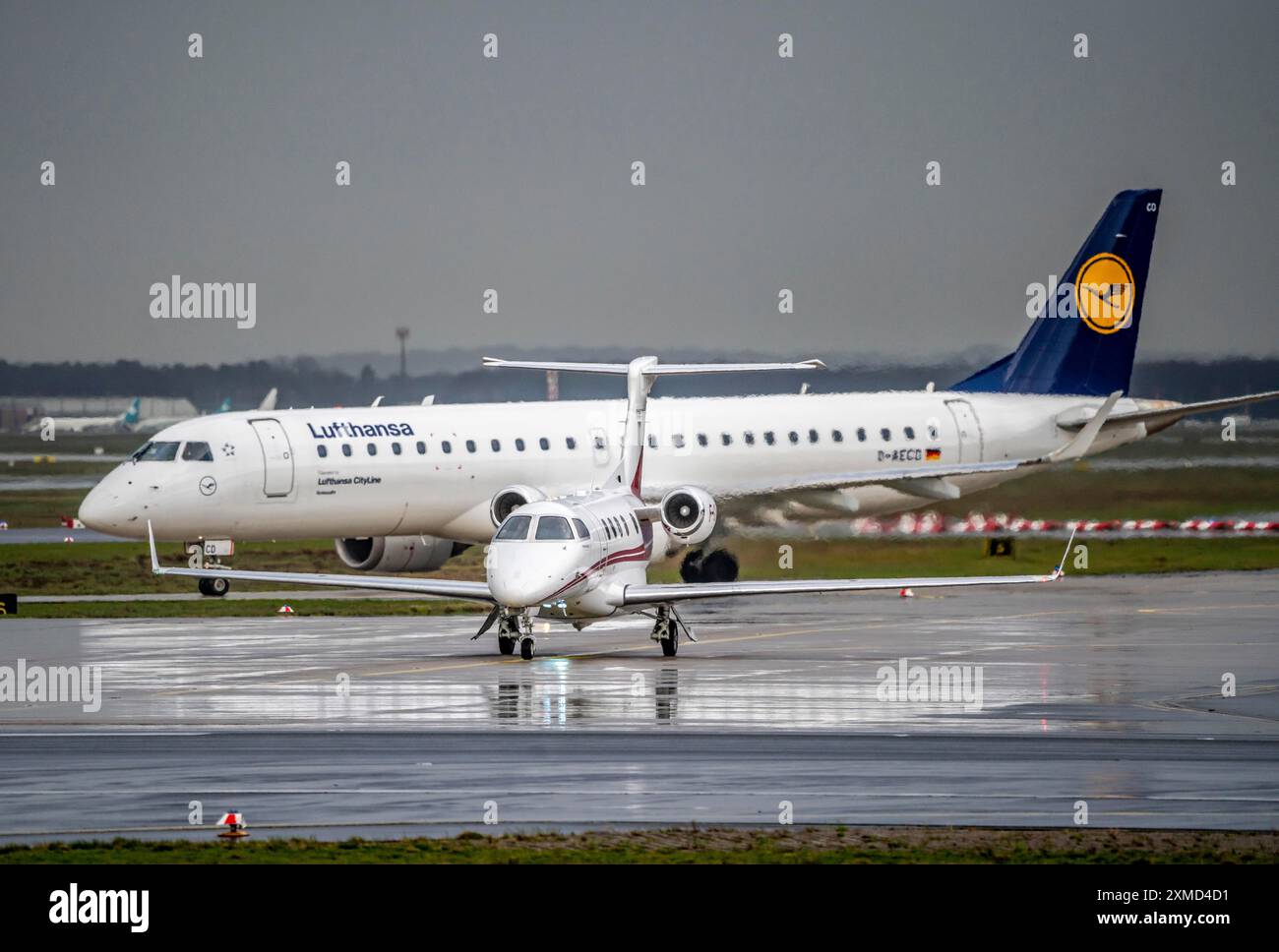 Private jet, Embraer Phenom 300 F-GXAE, on the western runway ...