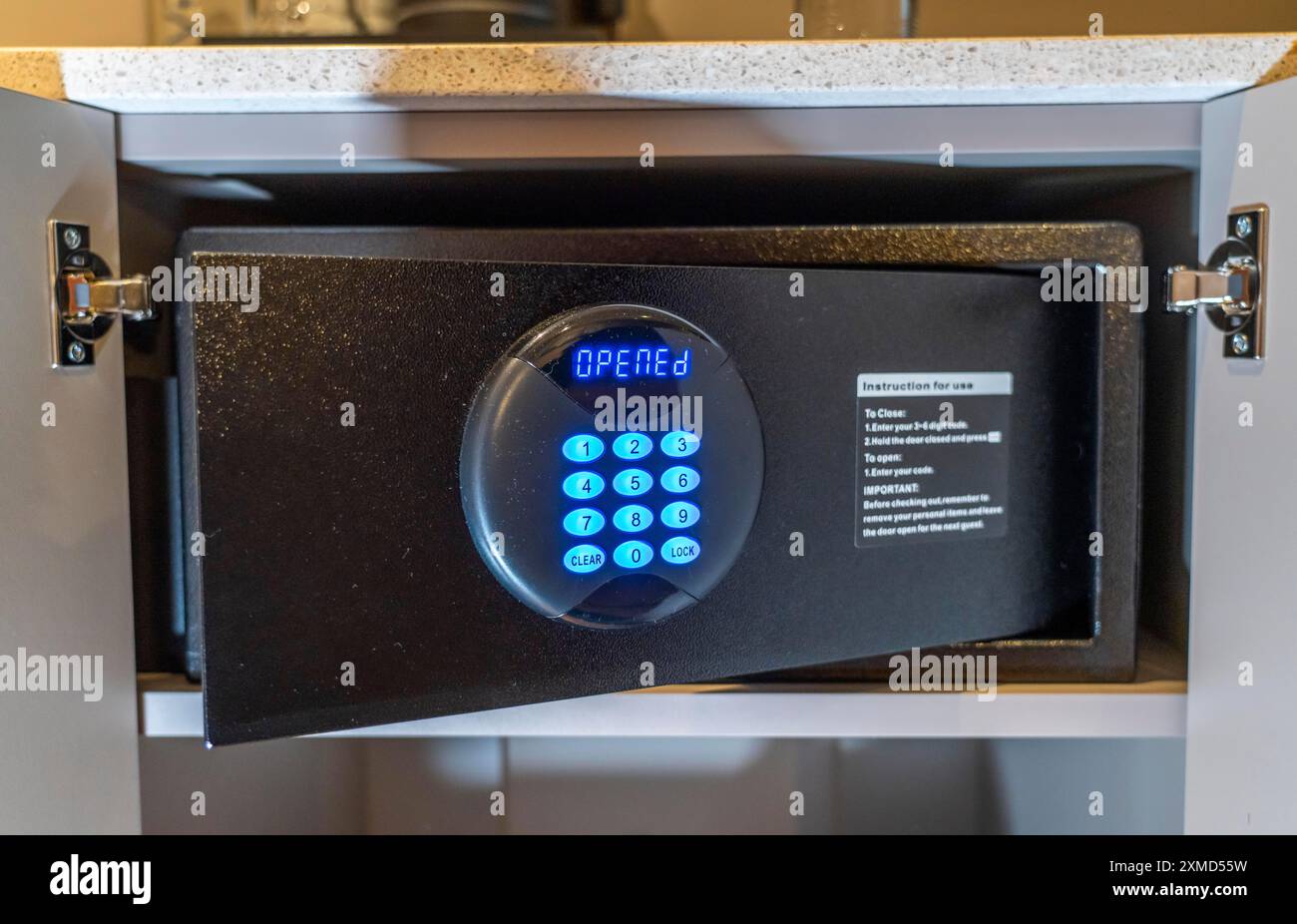Room safe in a hotel, keypad for entering a 6-digit numerical code to ...