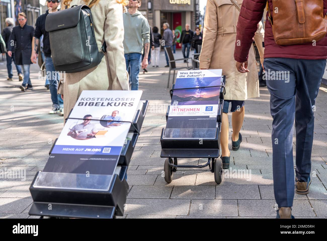 Jehovah's Witnesses with mobile information stands, with information in ...
