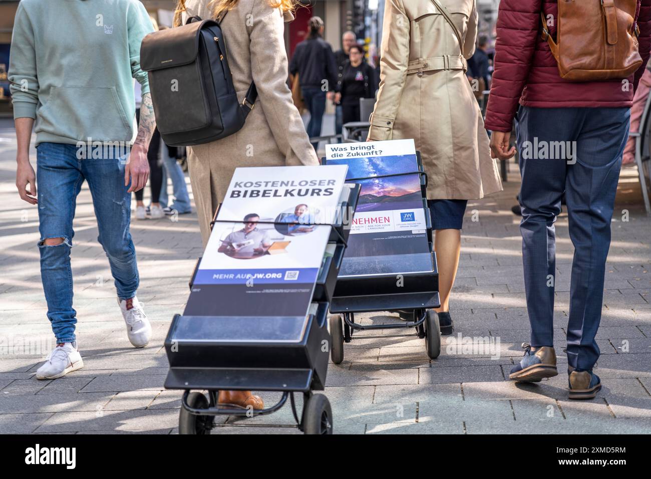 Jehovah's Witnesses with mobile information stands, with information in ...