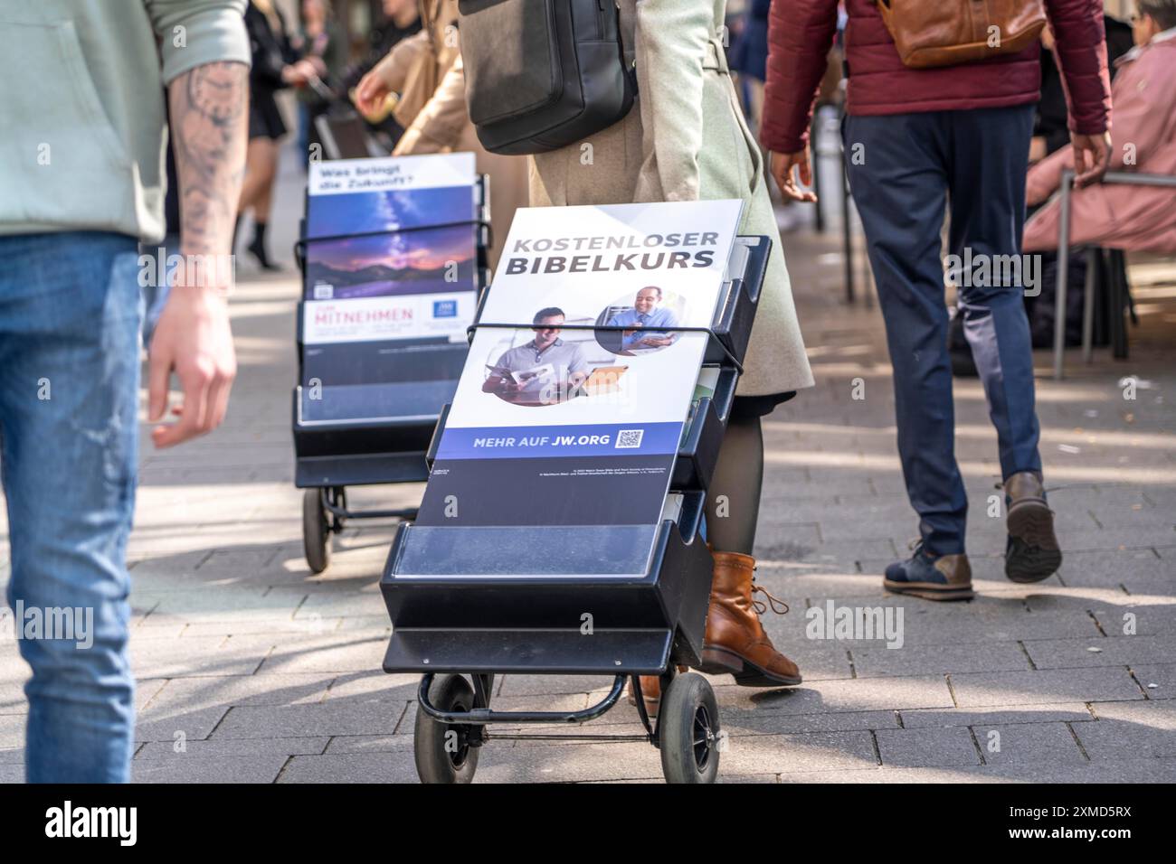 Jehovah's Witnesses with mobile information stands, with information in ...