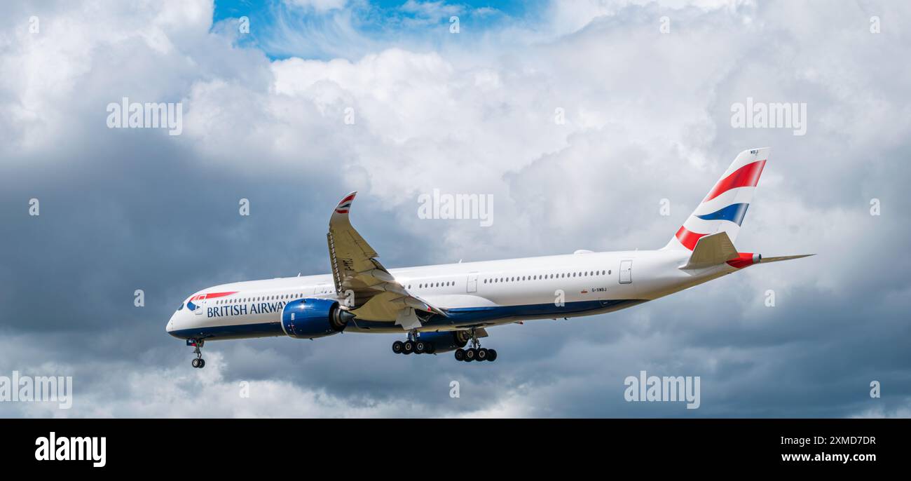 British Airways plane landing at Heathrow international airport. LONDON ...