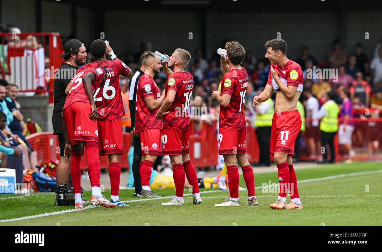 Crawley players take a drink in the heat during the pre-season friendly ...