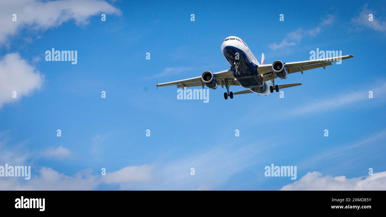 British Airways plane landing at Heathrow international airport. LONDON ...