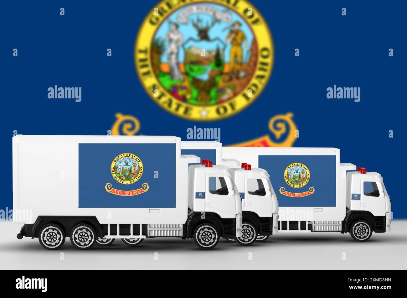 Idaho US state flag depicted on side wall of white delivery van close ...
