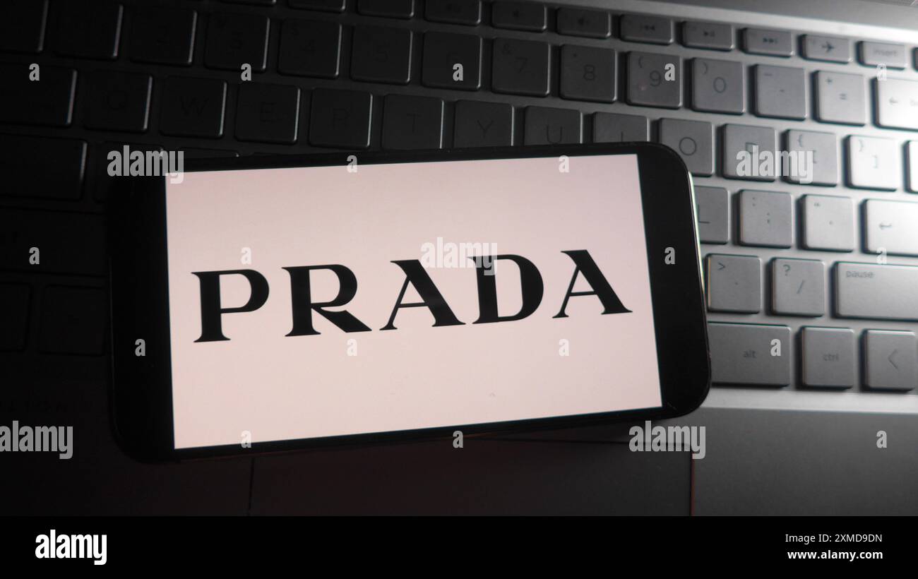 In this photo illustration, PRADA logo is displayed on a smartphone ...