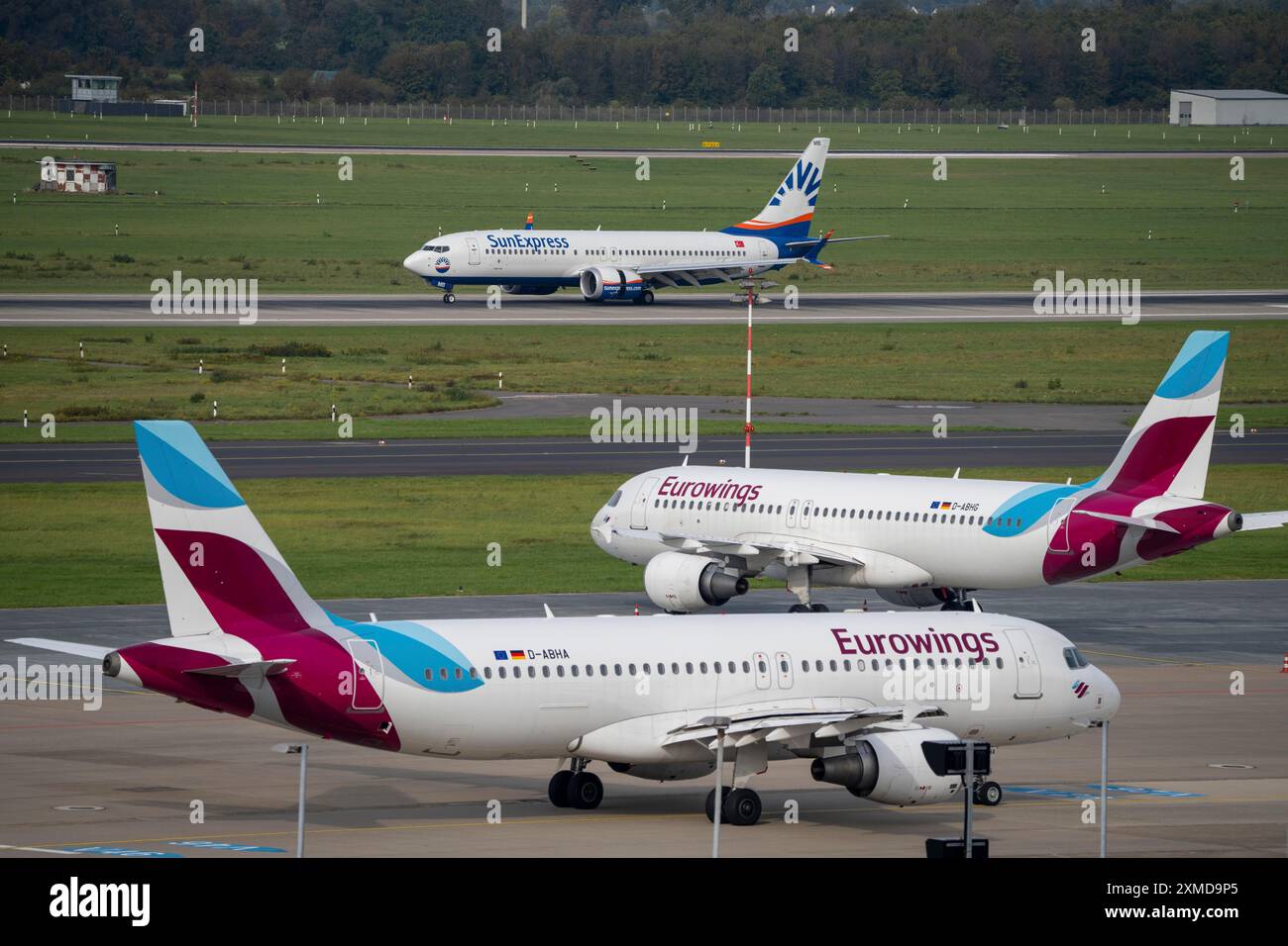 Duesseldorf Airport, SunExpress Boeing 737 on landing, Eurowings Airbus ...