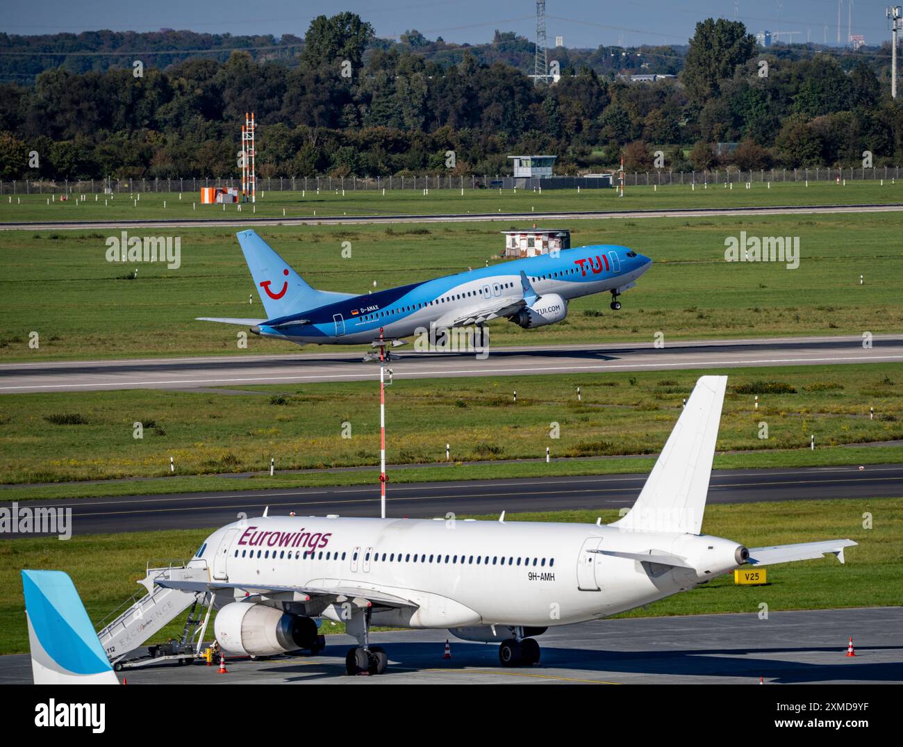 Duesseldorf Airport, TUIfly Boeing 737 on take-off, Eurowings aircraft ...