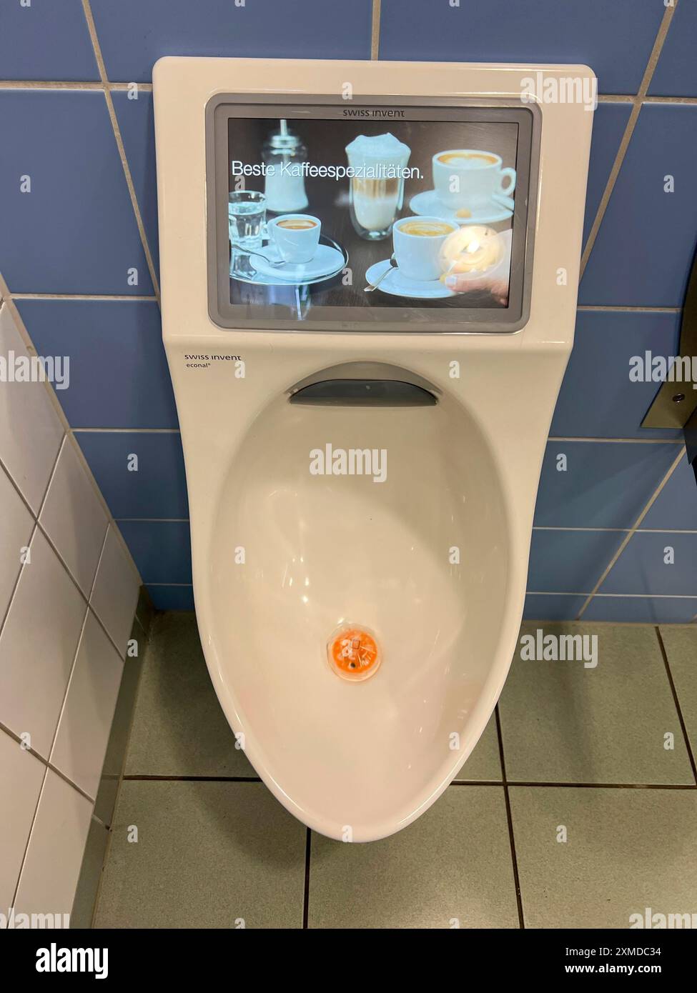 Toilet in a service station, on a motorway, gents, urinal with built-in ...
