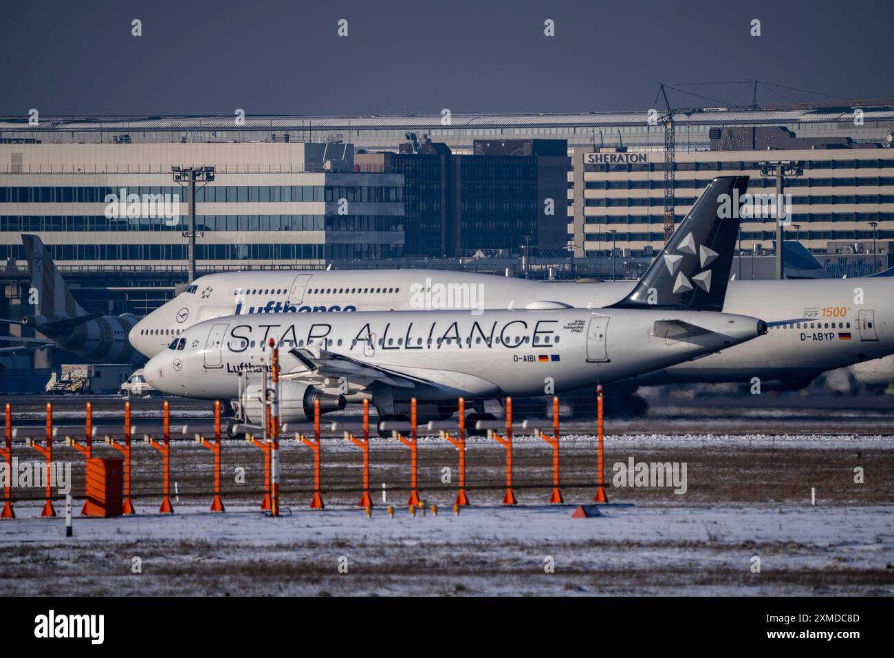 Aircraft on the taxiway at Frankfurt FRA airport, Fraport, in winter ...