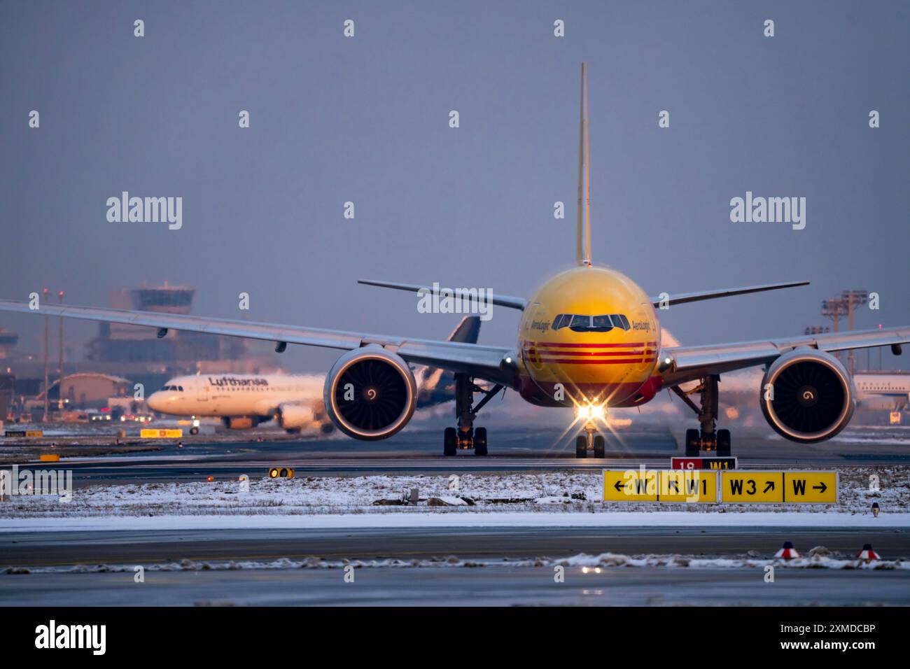 DHL, AeroLogic, Boeing 777F, on the taxiway to Runway West, Frankfurt FRA Airport, Fraport, in ...