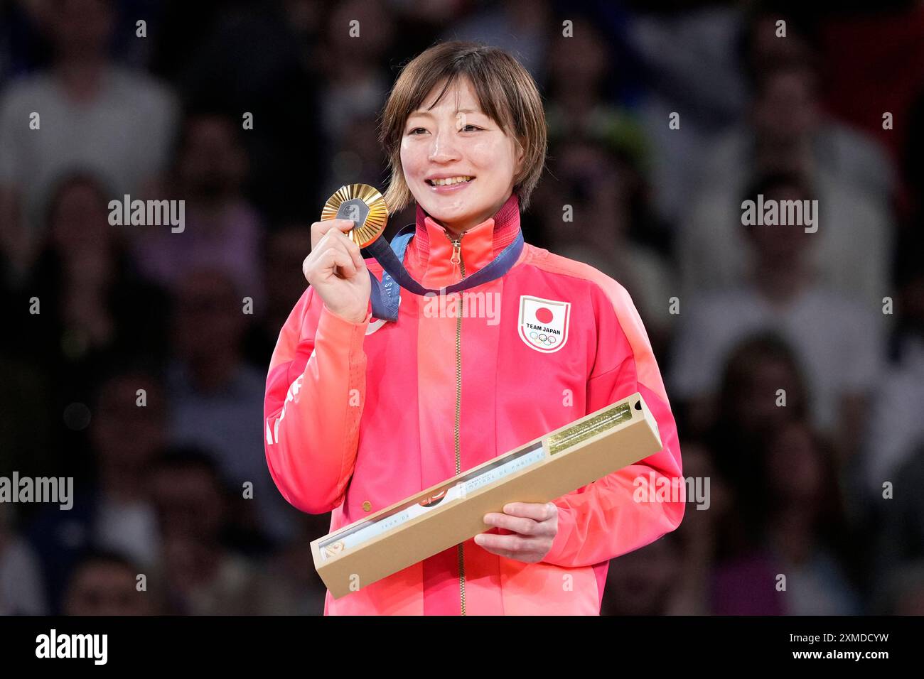 Japan's Natsumi Tsunoda pose with her gold medal at the podium of the ...