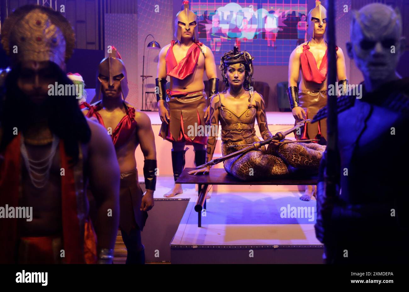 Kathmandu, Nepal. 27th July, 2024. A woman dressed as Medusa from Greek mythology performs on ...