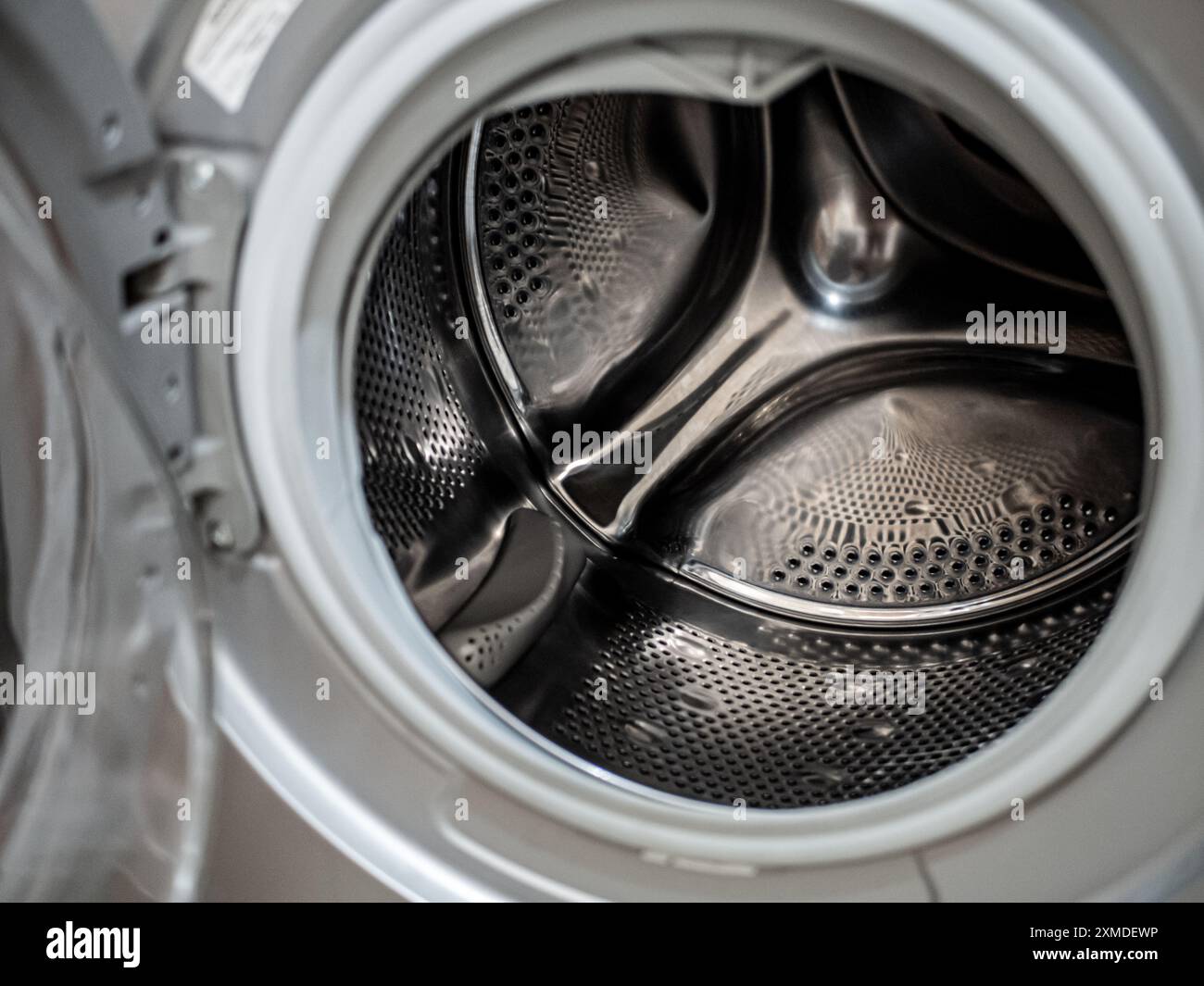 The inner drum of the washing machine shines Stock Photo - Alamy