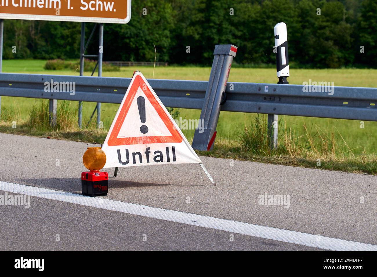 Autobahn A96, Bavaria, Germany - 26 July 2024: A warning triangle with ...