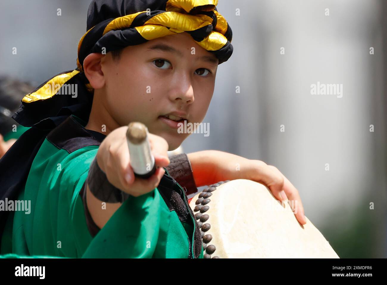 Tokyo, Japan. 27th July, 2024. An Eisa dancer performs during the 21st ...